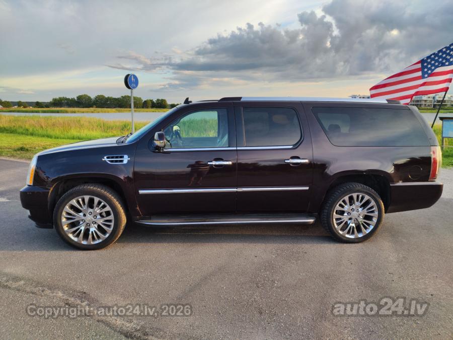 Sarkans Cadillac Escalade 2009 Tallina, ar dzinēja tilpumu 6.20 L un nobraukumu 277 tūkst. km par 10000 €, foto 1 vietnē AUTOMOTO.COM.LV