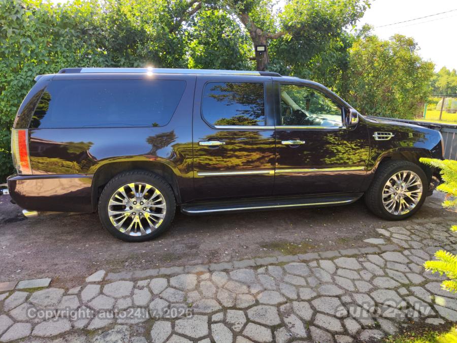 Sarkans Cadillac Escalade 2009 Tallina, ar dzinēja tilpumu 6.20 L un nobraukumu 277 tūkst. km par 10000 €, foto 6 vietnē AUTOMOTO.COM.LV