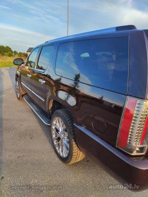 Sarkans Cadillac Escalade 2009 Tallina, ar dzinēja tilpumu 6.20 L un nobraukumu 277 tūkst. km par 10000 €, foto 8 vietnē AUTOMOTO.COM.LV