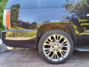 Sarkans Cadillac Escalade 2009 Tallina, ar dzinēja tilpumu 6.20 L un nobraukumu 277 tūkst. km par 10000 €, foto 10 vietnē AUTOMOTO.COM.LV