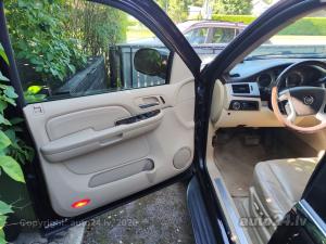 Sarkans Cadillac Escalade 2009 Tallina, ar dzinēja tilpumu 6.20 L un nobraukumu 277 tūkst. km par 10000 €, foto 31 vietnē AUTOMOTO.COM.LV