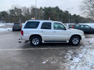 White Cadillac Escalade 2004 in Tallinn, with an engine capacity of 6.00 L and mileage of 388 thousand km for 6700 €, photo 6 on AUTOMOTO.COM.LV