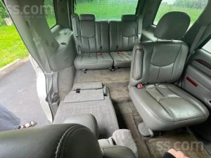 White Cadillac Escalade 2006 in Riga, with an engine capacity of 6.00 L and mileage of 321 thousand km for 7500 €, photo 6 on AUTOMOTO.COM.LV