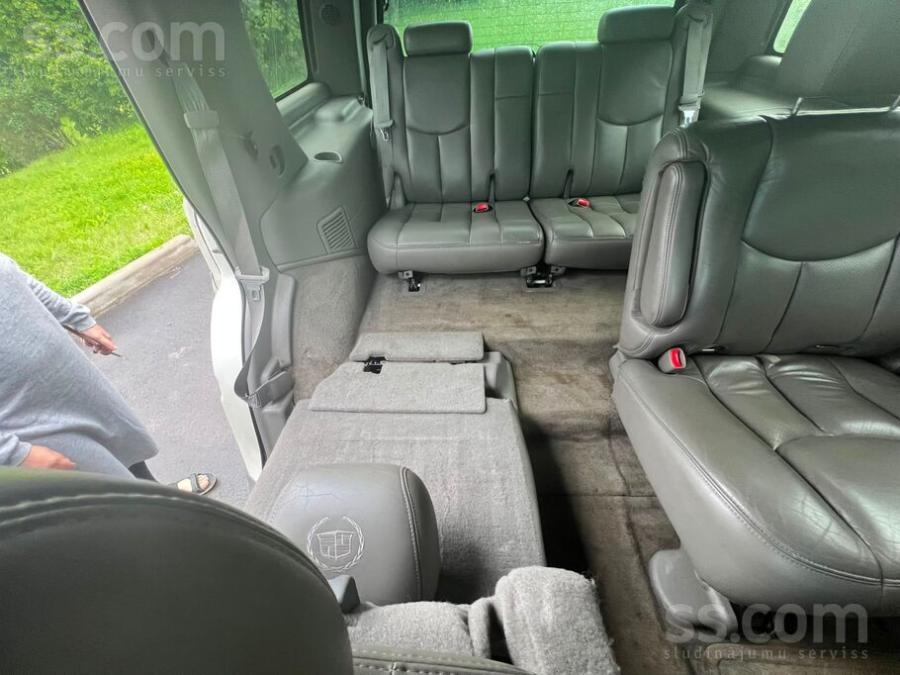 White Cadillac Escalade 2006 in Riga, with an engine capacity of 6.00 L and mileage of 321 thousand km for 7500 €, photo 7 on AUTOMOTO.COM.LV