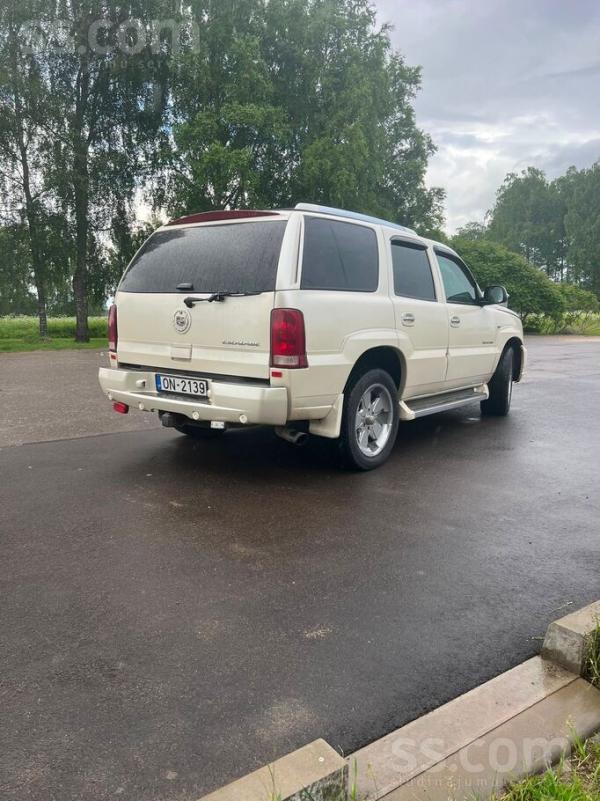 Balts Cadillac Escalade 2006 Rīga, ar dzinēja tilpumu 6.00 L un nobraukumu 323 tūkst. km par 5350 €, foto 3 vietnē AUTOMOTO.COM.LV