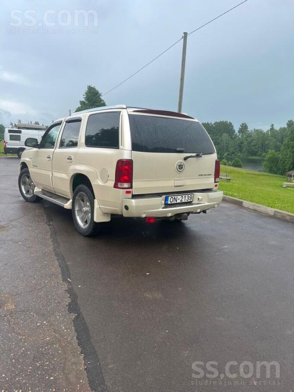 Balts Cadillac Escalade 2006 Rīga, ar dzinēja tilpumu 6.00 L un nobraukumu 323 tūkst. km par 5350 €, foto 4 vietnē AUTOMOTO.COM.LV