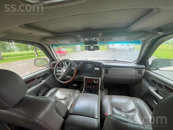 Balts Cadillac Escalade 2006 Rīga, ar dzinēja tilpumu 6.00 L un nobraukumu 323 tūkst. km par 5350 €, foto 7 vietnē AUTOMOTO.COM.LV