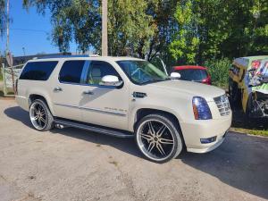 White Cadillac Escalade 2007 in Vilnius, with an engine capacity of 6.20 L and mileage of 130 thousand km for 13950 €, photo 13 on AUTOMOTO.COM.LV