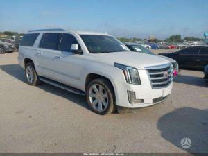 White Cadillac Escalade 2019 in Vilnius, with an engine capacity of 6.16 L and mileage of 193 thousand km for 11999 €, photo  on AUTOMOTO.COM.LV