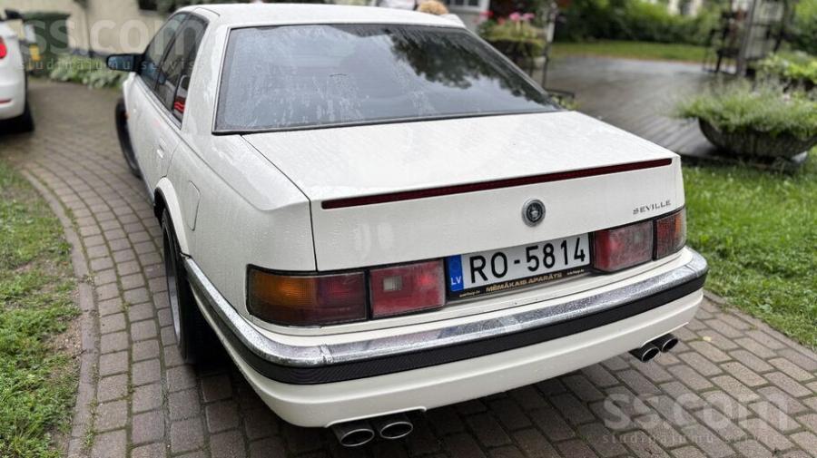 Balts Cadillac Seville 1992 Ogre, ar dzinēja tilpumu 4.90 L un nobraukumu 293 tūkst. km par 5995 €, foto 1 vietnē AUTOMOTO.COM.LV