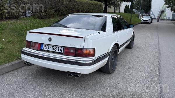 Balts Cadillac Seville 1992 Ogre, ar dzinēja tilpumu 4.90 L un nobraukumu 293 tūkst. km par 5995 €, foto 5 vietnē AUTOMOTO.COM.LV