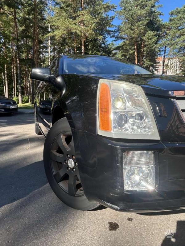 Cadillac SRX 2007 Viļņa vietnē Melns Cadillac SRX 2007 Viļņa, ar dzinēja tilpumu 3.60 L un nobraukumu 182 tūkst. km par 4200 €, foto 1 vietnē AUTOMOTO.COM.LV