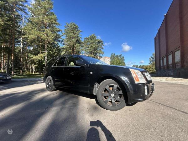 Cadillac SRX 2007 Viļņa vietnē Melns Cadillac SRX 2007 Viļņa, ar dzinēja tilpumu 3.60 L un nobraukumu 182 tūkst. km par 4200 €, foto 3 vietnē AUTOMOTO.COM.LV