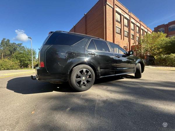 Cadillac SRX 2007 Viļņa vietnē Melns Cadillac SRX 2007 Viļņa, ar dzinēja tilpumu 3.60 L un nobraukumu 182 tūkst. km par 4200 €, foto 4 vietnē AUTOMOTO.COM.LV
