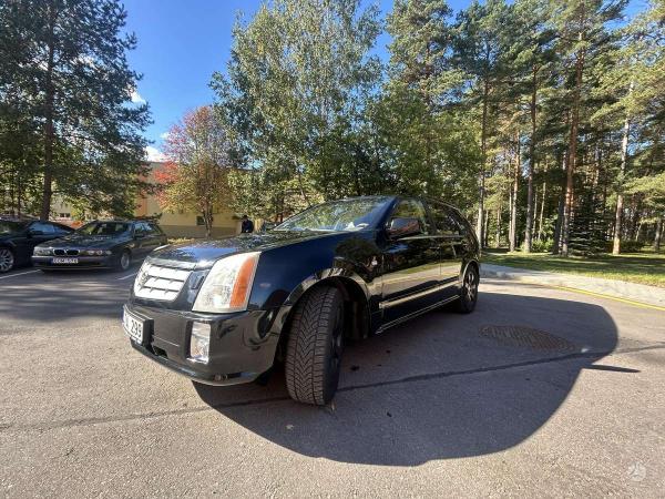 Cadillac SRX 2007 Viļņa vietnē Melns Cadillac SRX 2007 Viļņa, ar dzinēja tilpumu 3.60 L un nobraukumu 182 tūkst. km par 4200 €, foto 8 vietnē AUTOMOTO.COM.LV