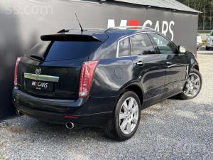 Black Cadillac SRX 2013 in Riga, with an engine capacity of 3.00 L and mileage of 137 thousand km for 9990 €, photo 4 on AUTOMOTO.COM.LV