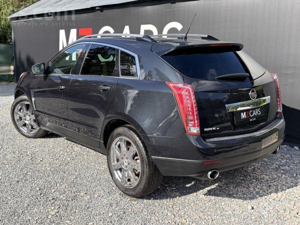 Black Cadillac SRX 2013 in Riga, with an engine capacity of 3.00 L and mileage of 137 thousand km for 9990 €, photo 4 on AUTOMOTO.COM.LV