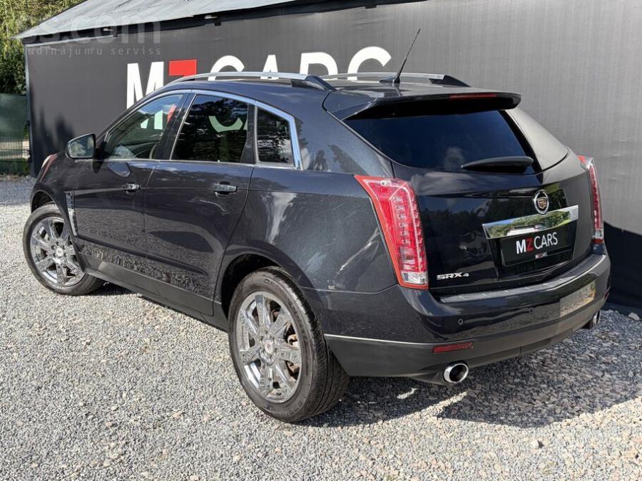 Black Cadillac SRX 2013 in Riga, with an engine capacity of 3.00 L and mileage of 137 thousand km for 9990 €, photo 5 on AUTOMOTO.COM.LV