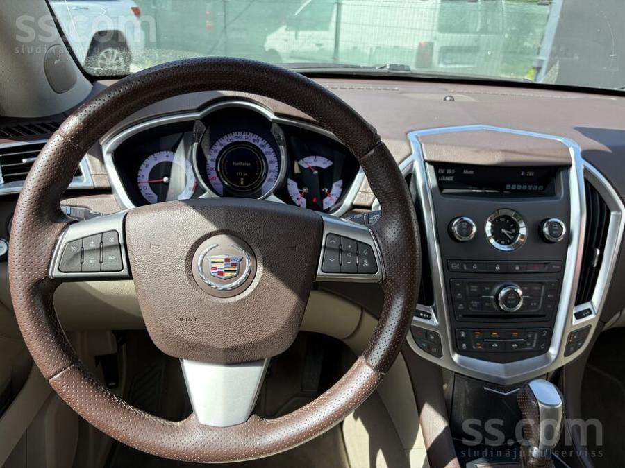 Black Cadillac SRX 2013 in Riga, with an engine capacity of 3.00 L and mileage of 137 thousand km for 9990 €, photo 11 on AUTOMOTO.COM.LV