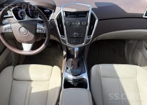 Black Cadillac SRX 2013 in Riga, with an engine capacity of 3.00 L and mileage of 137 thousand km for 9990 €, photo 12 on AUTOMOTO.COM.LV