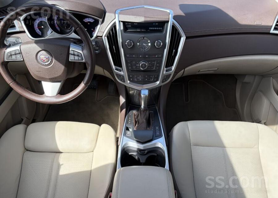 Black Cadillac SRX 2013 in Riga, with an engine capacity of 3.00 L and mileage of 137 thousand km for 9990 €, photo 12 on AUTOMOTO.COM.LV