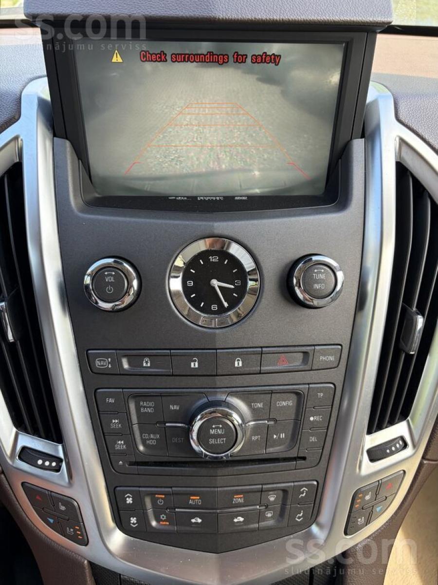 Black Cadillac SRX 2013 in Riga, with an engine capacity of 3.00 L and mileage of 137 thousand km for 9990 €, photo 13 on AUTOMOTO.COM.LV