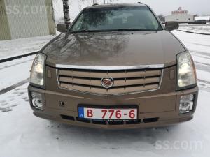 Brown Cadillac SRX 2009 in Riga, with an engine capacity of 3.60 L and mileage of 0 thousand km for 4990 €, photo 2 on AUTOMOTO.COM.LV