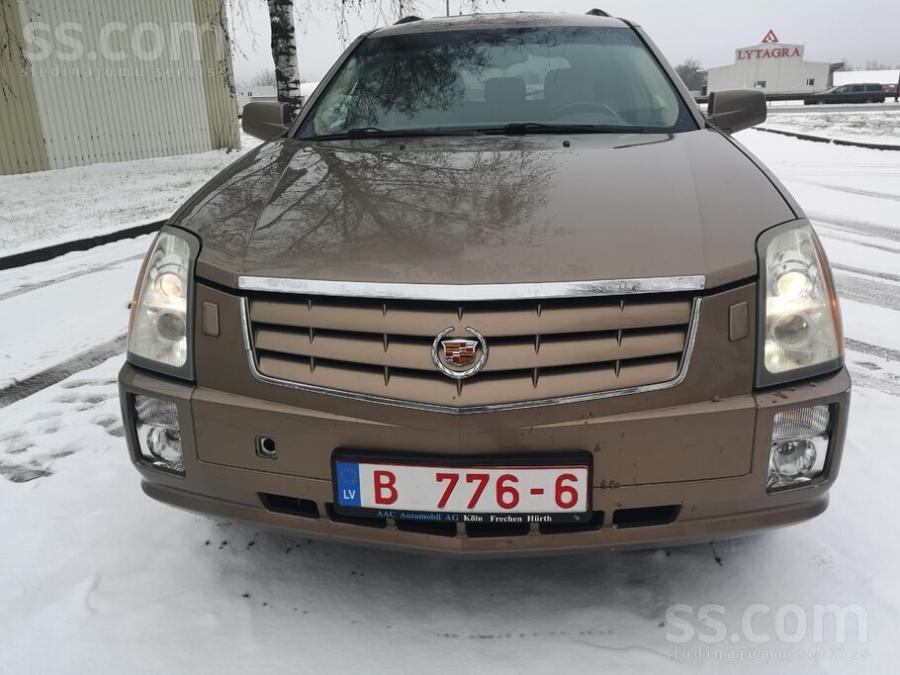 Brown Cadillac SRX 2009 in Riga, with an engine capacity of 3.60 L and mileage of 0 thousand km for 4990 €, photo 2 on AUTOMOTO.COM.LV