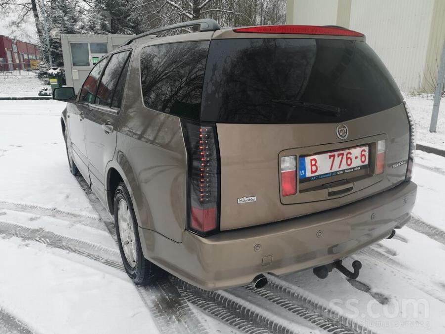 Brown Cadillac SRX 2009 in Riga, with an engine capacity of 3.60 L and mileage of 0 thousand km for 4990 €, photo 6 on AUTOMOTO.COM.LV