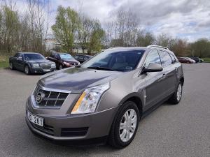 Brūns Cadillac SRX 2011 Viļņa, ar dzinēja tilpumu 2.99 L un nobraukumu 331 tūkst. km par 4000 €, foto  vietnē AUTOMOTO.COM.LV