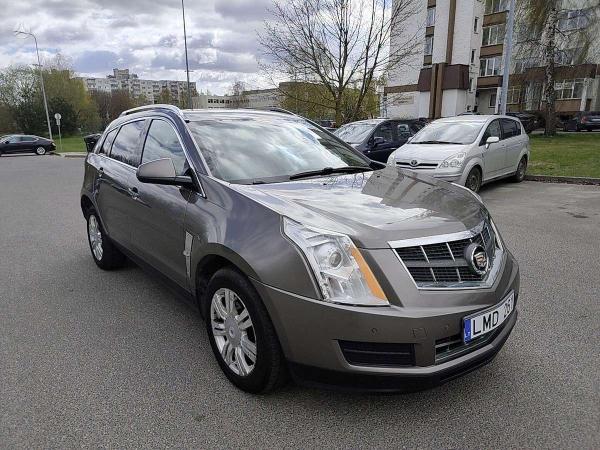Brown Cadillac SRX 2011 in Vilnius, with an engine capacity of 2.99 L and mileage of 331 thousand km for 4000 €, photo 3 on AUTOMOTO.COM.LV