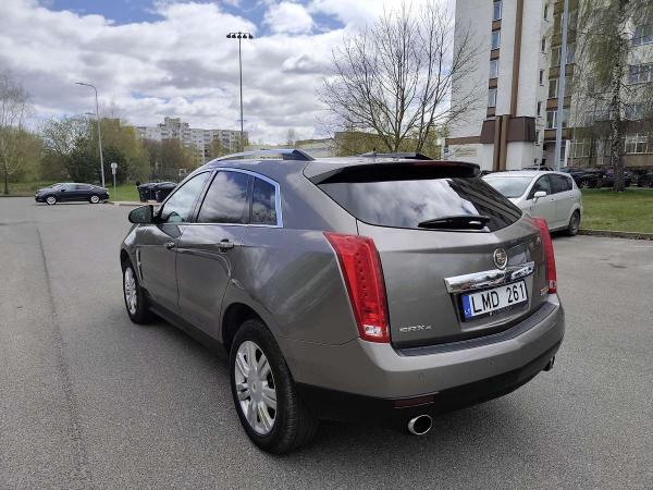 Brown Cadillac SRX 2011 in Vilnius, with an engine capacity of 2.99 L and mileage of 331 thousand km for 4000 €, photo 4 on AUTOMOTO.COM.LV