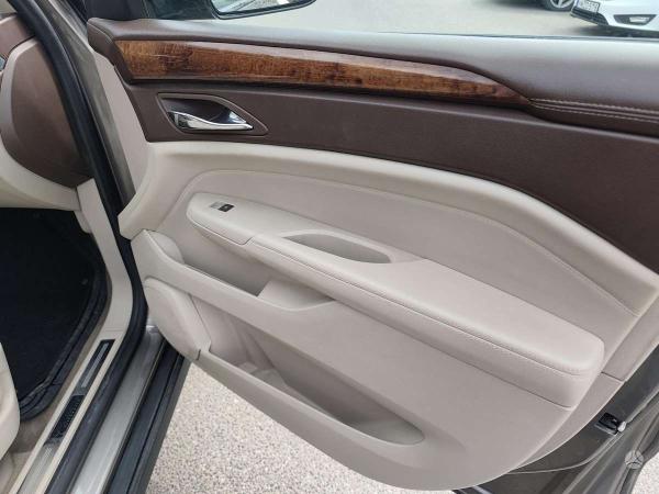 Brown Cadillac SRX 2011 in Vilnius, with an engine capacity of 2.99 L and mileage of 331 thousand km for 4000 €, photo 11 on AUTOMOTO.COM.LV