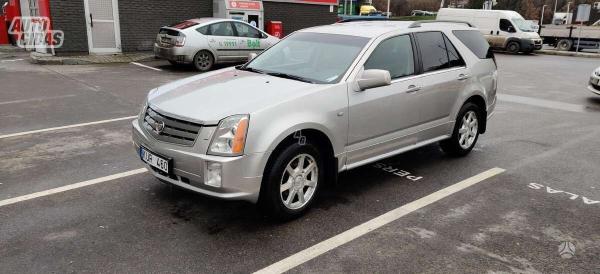 Pelēks Cadillac SRX 2006 Viļņa, ar dzinēja tilpumu 4.60 L un nobraukumu 217 tūkst. km par 2900 €, foto 1 vietnē AUTOMOTO.COM.LV