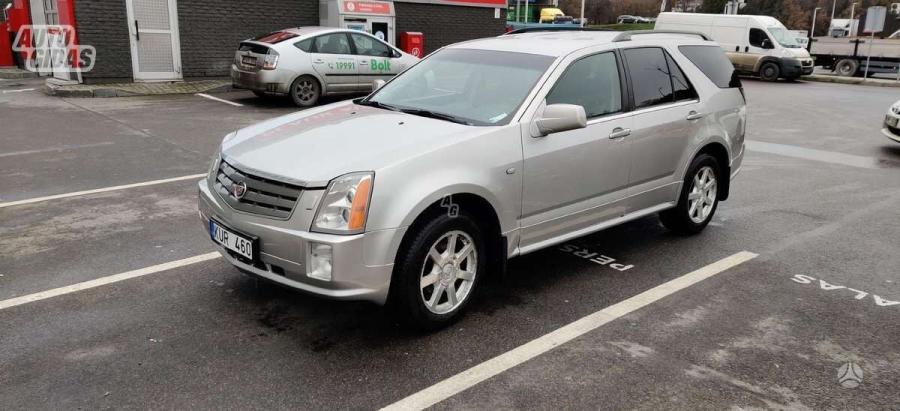 Grey Cadillac SRX 2006 in Vilnius, with an engine capacity of 4.60 L and mileage of 217 thousand km for 2900 €, photo 1 on AUTOMOTO.COM.LV