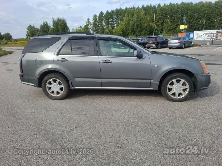 Grey Cadillac SRX 2007 in Tartu, with an engine capacity of 3.60 L and mileage of 225 thousand km for 1999 €, photo 9 on AUTOMOTO.COM.LV