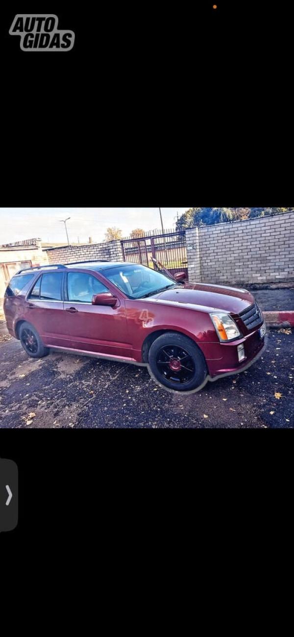 Sarkans Cadillac SRX 2005 Kauņa, ar dzinēja tilpumu 3.60 L un nobraukumu 180 tūkst. km par 1200 €, foto 3 vietnē AUTOMOTO.COM.LV