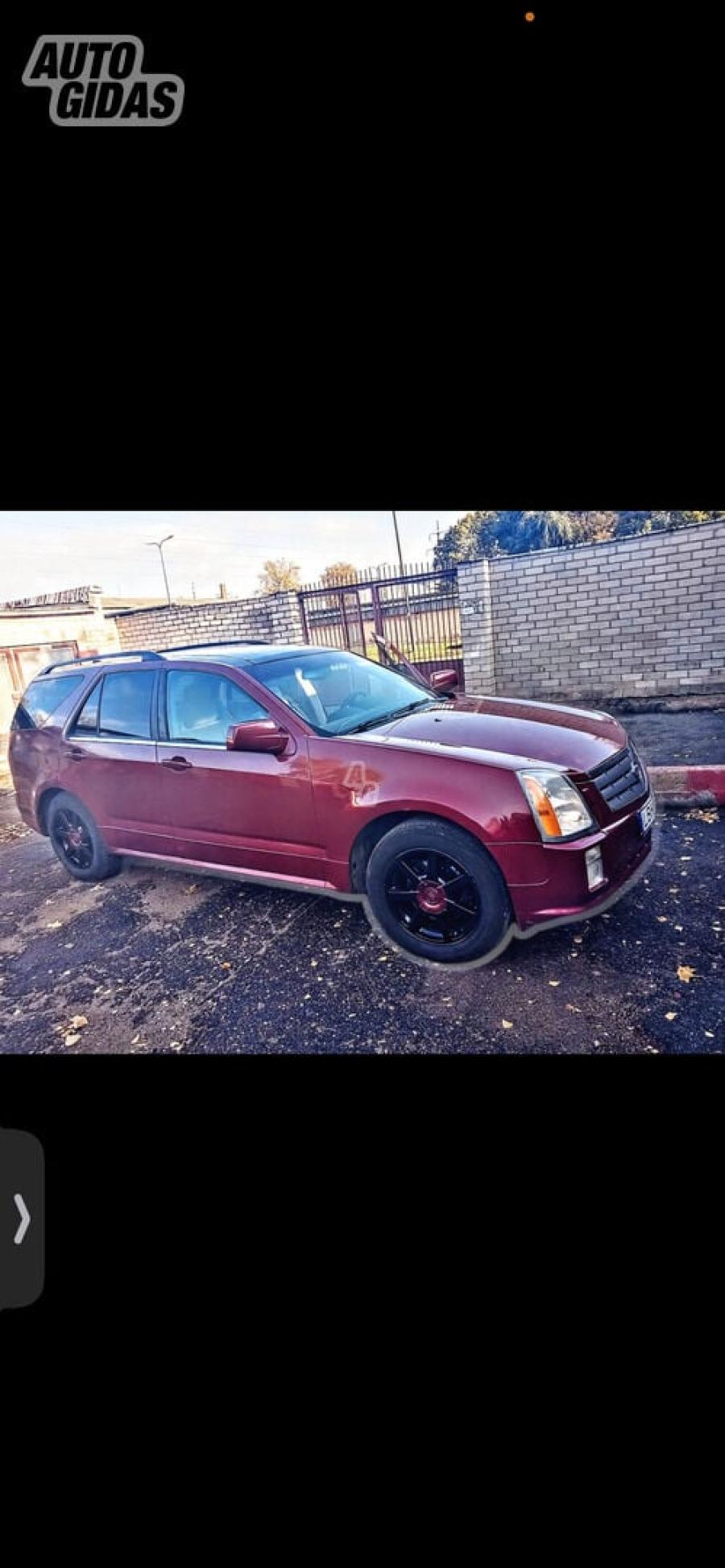 Red Cadillac SRX 2005 in Kaunas, with an engine capacity of 3.60 L and mileage of 180 thousand km for 1200 €, photo 3 on AUTOMOTO.COM.LV