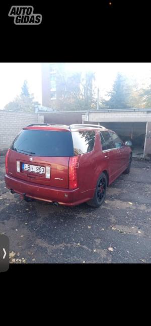 Red Cadillac SRX 2005 in Kaunas, with an engine capacity of 3.60 L and mileage of 180 thousand km for 1200 €, photo 4 on AUTOMOTO.COM.LV