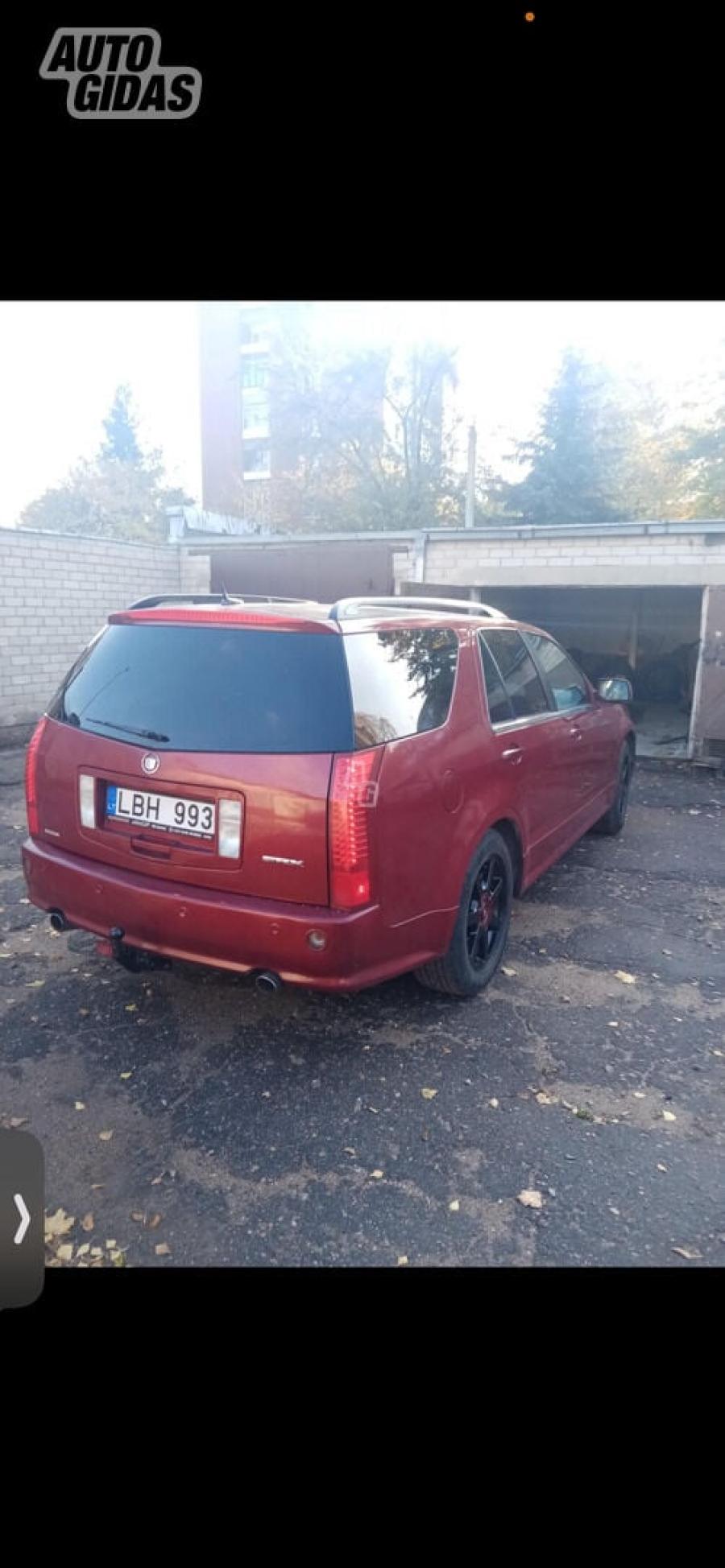 Red Cadillac SRX 2005 in Kaunas, with an engine capacity of 3.60 L and mileage of 180 thousand km for 1200 €, photo 4 on AUTOMOTO.COM.LV