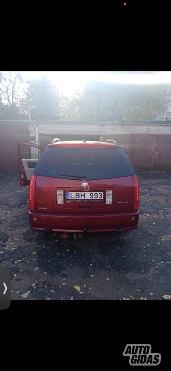 Sarkans Cadillac SRX 2005 Kauņa, ar dzinēja tilpumu 3.60 L un nobraukumu 180 tūkst. km par 1200 €, foto 5 vietnē AUTOMOTO.COM.LV