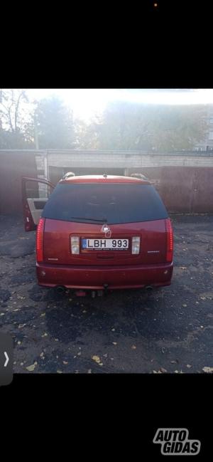 Red Cadillac SRX 2005 in Kaunas, with an engine capacity of 3.60 L and mileage of 180 thousand km for 1200 €, photo 5 on AUTOMOTO.COM.LV