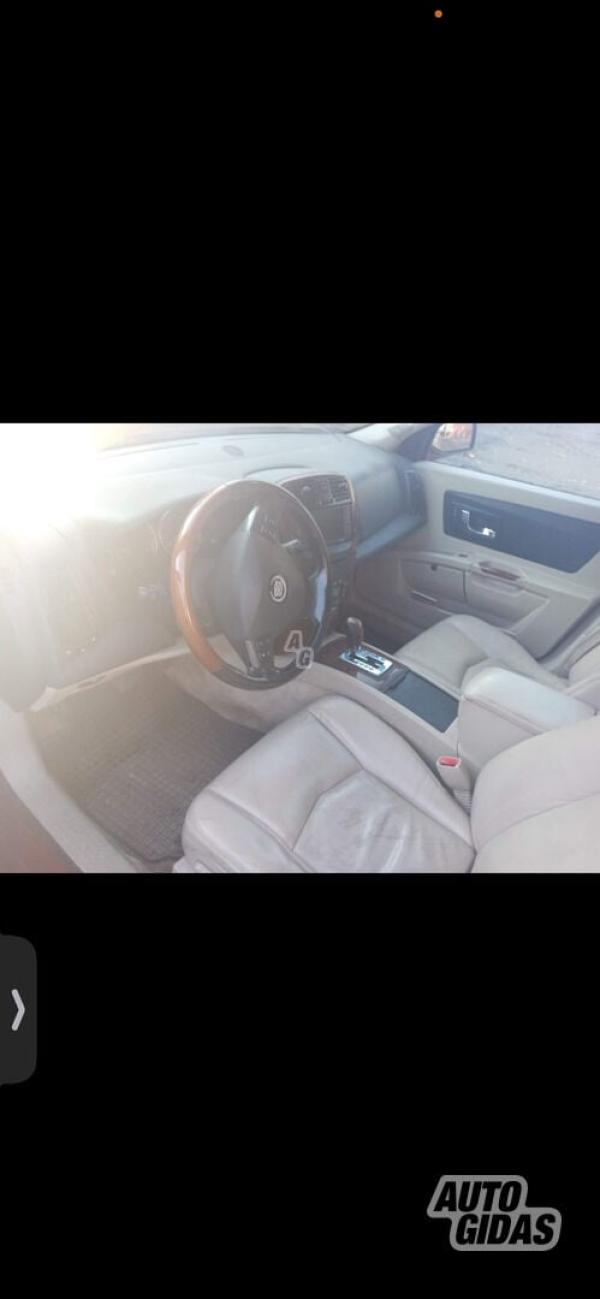 Sarkans Cadillac SRX 2005 Kauņa, ar dzinēja tilpumu 3.60 L un nobraukumu 180 tūkst. km par 1200 €, foto 8 vietnē AUTOMOTO.COM.LV