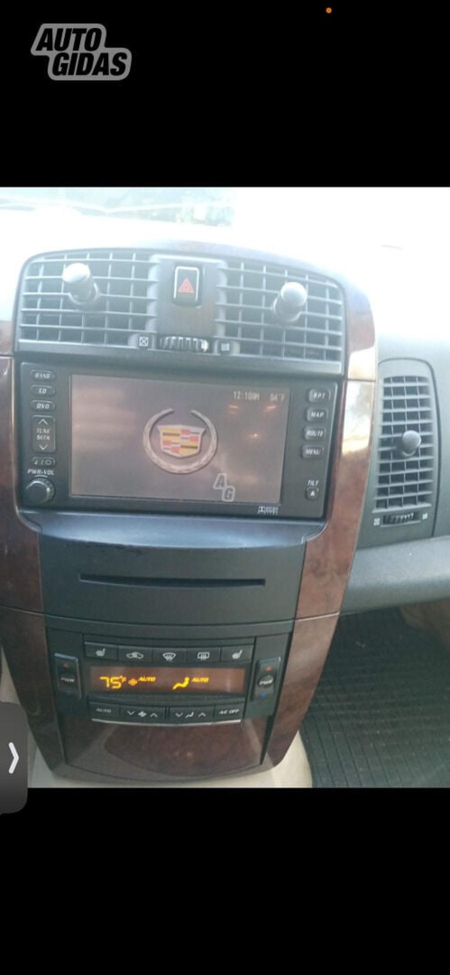 Red Cadillac SRX 2005 in Kaunas, with an engine capacity of 3.60 L and mileage of 180 thousand km for 1200 €, photo 10 on AUTOMOTO.COM.LV