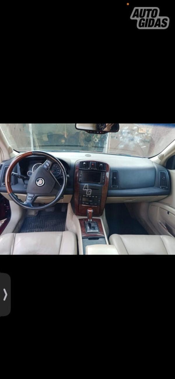 Sarkans Cadillac SRX 2005 Kauņa, ar dzinēja tilpumu 3.60 L un nobraukumu 180 tūkst. km par 1200 €, foto 11 vietnē AUTOMOTO.COM.LV
