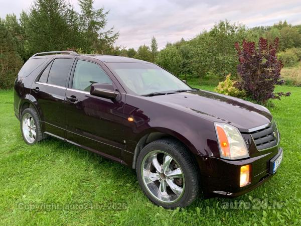 Red Cadillac SRX 2008 in Tartu, with an engine capacity of 3.60 L and mileage of 295 thousand km for 3790 €, photo 1 on AUTOMOTO.COM.LV