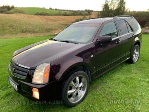 Red Cadillac SRX 2008 in Tartu, with an engine capacity of 3.60 L and mileage of 295 thousand km for 3790 €, photo 3 on AUTOMOTO.COM.LV