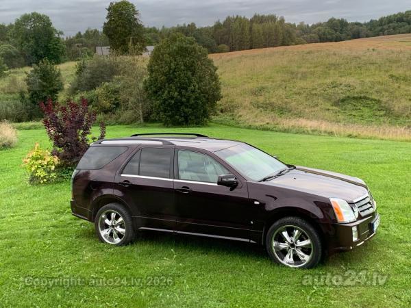 Red Cadillac SRX 2008 in Tartu, with an engine capacity of 3.60 L and mileage of 295 thousand km for 3790 €, photo 3 on AUTOMOTO.COM.LV