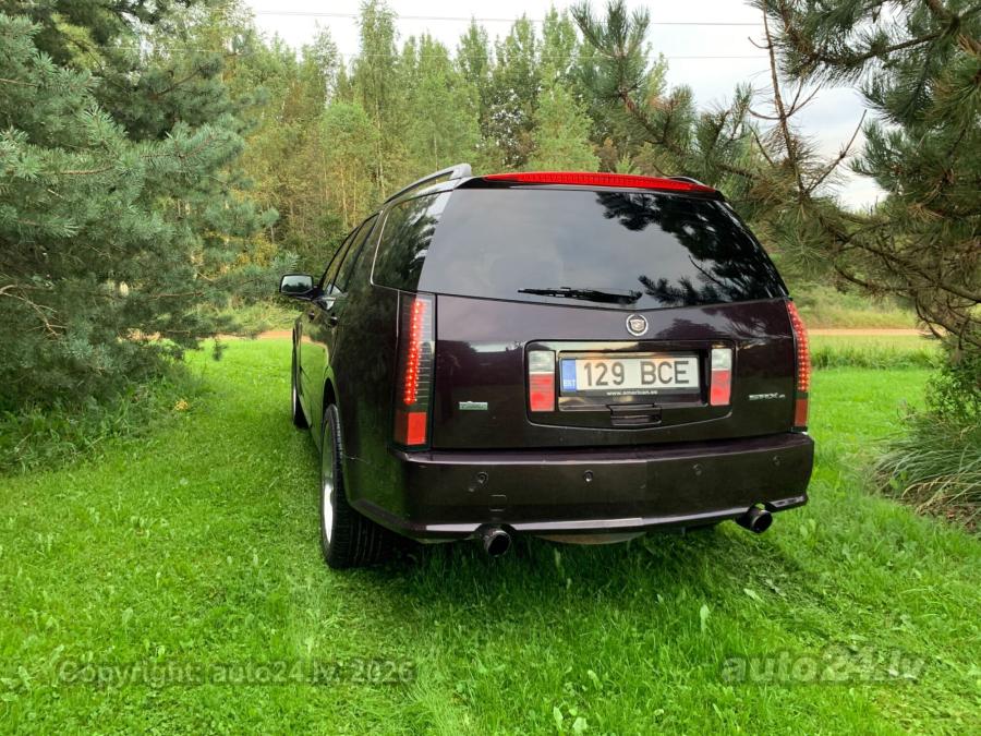 Red Cadillac SRX 2008 in Tartu, with an engine capacity of 3.60 L and mileage of 295 thousand km for 3790 €, photo 6 on AUTOMOTO.COM.LV
