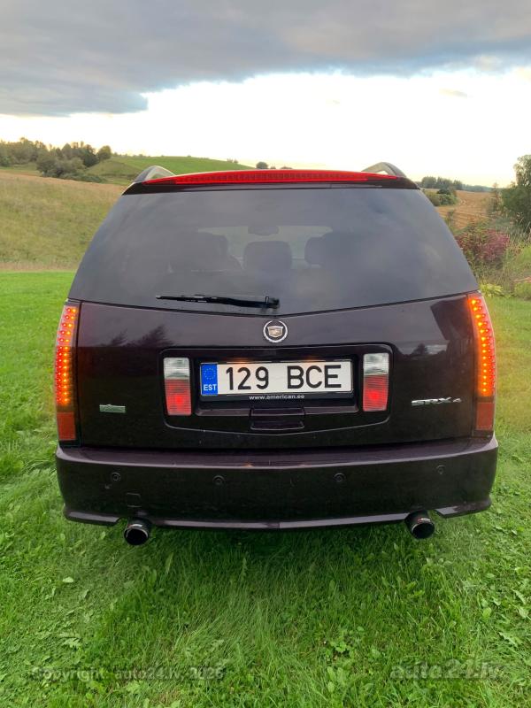 Red Cadillac SRX 2008 in Tartu, with an engine capacity of 3.60 L and mileage of 295 thousand km for 3790 €, photo 6 on AUTOMOTO.COM.LV